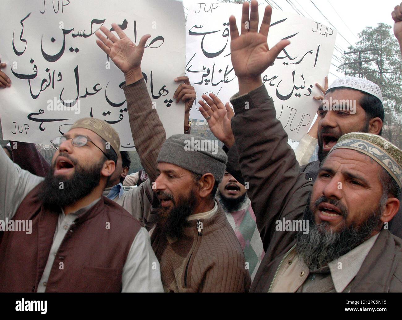 Activists of a Pakistani religious party chant anti U.S. slogans during ...