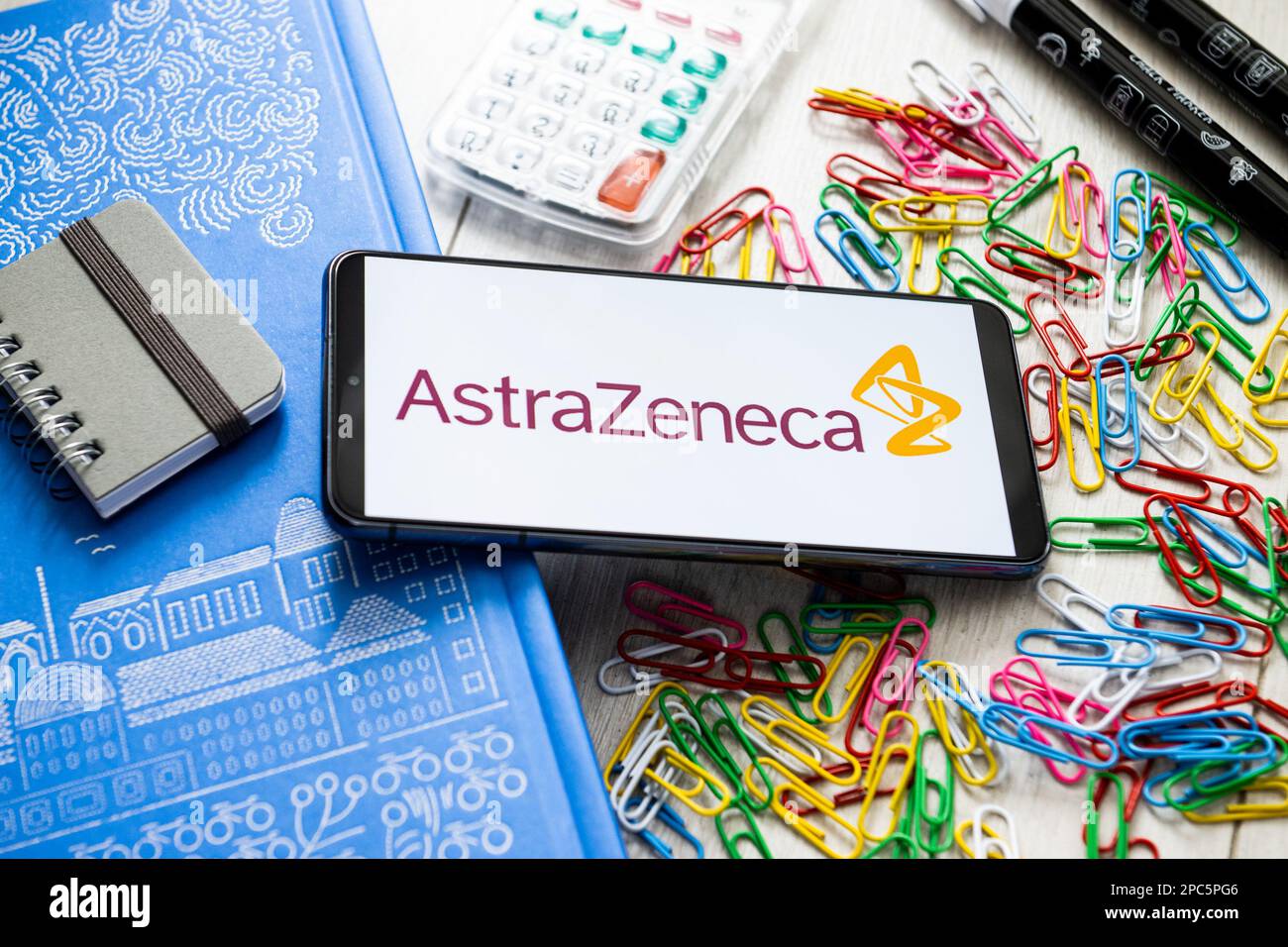 In this photo illustration a Astra Zeneca logo seen displayed on a ...
