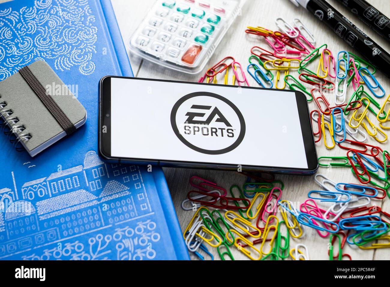 In this photo illustration a EA Sports logo seen displayed on a ...