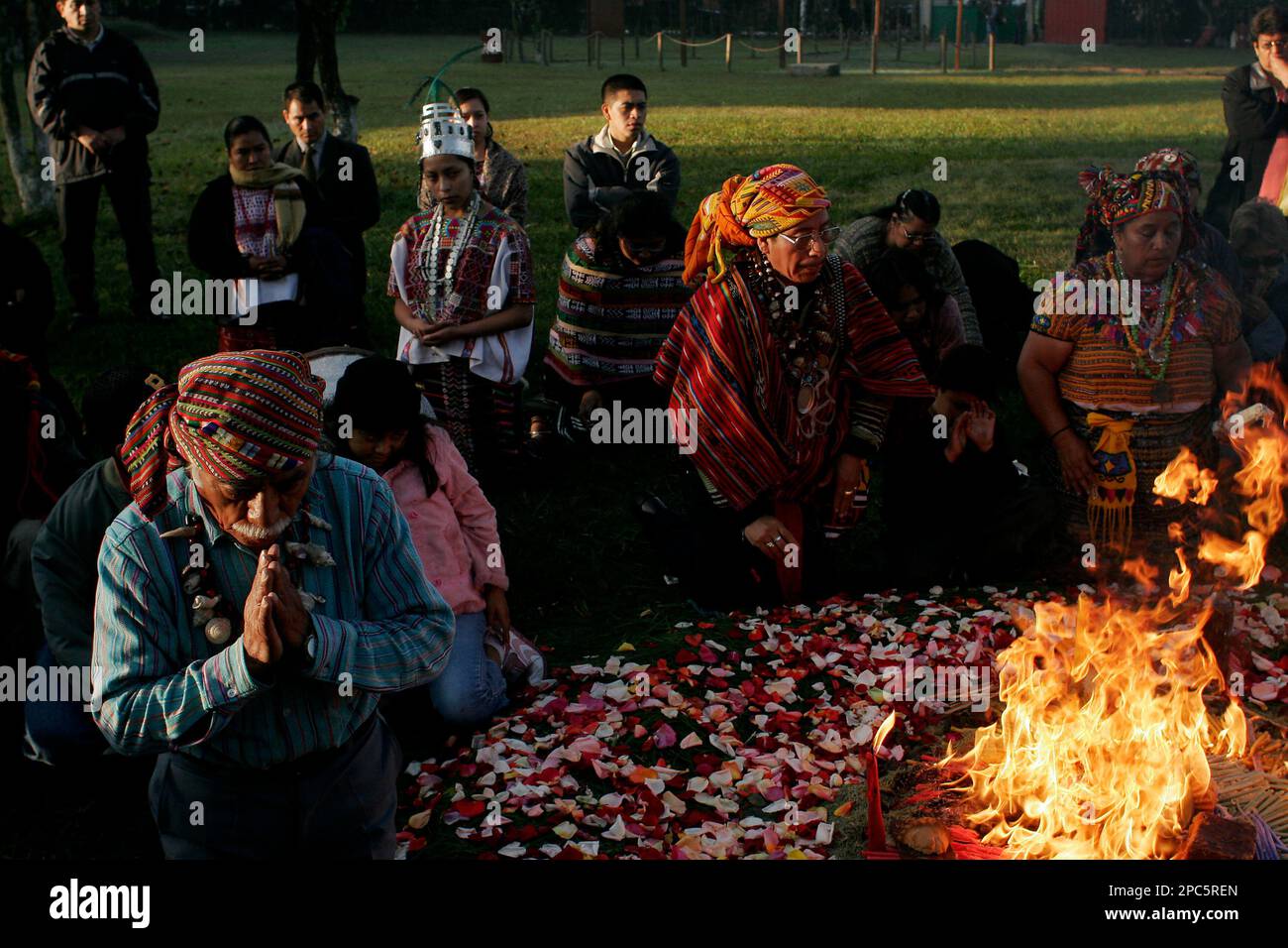 Mayan priests pray during a ceremony to mark the 10th anniversary of ...