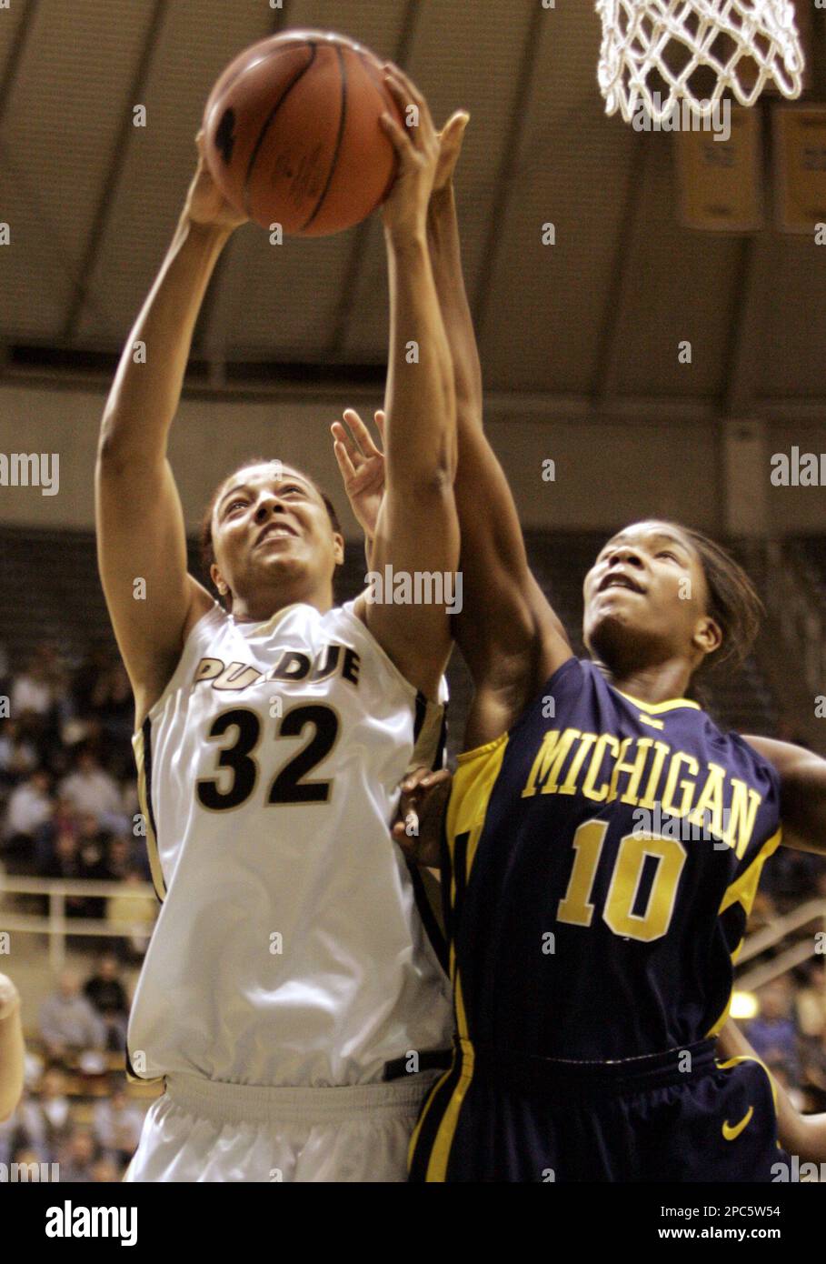 Purdue's Lindsay Wisdom-Hylton (32) pulls down a rebound over Michigan ...