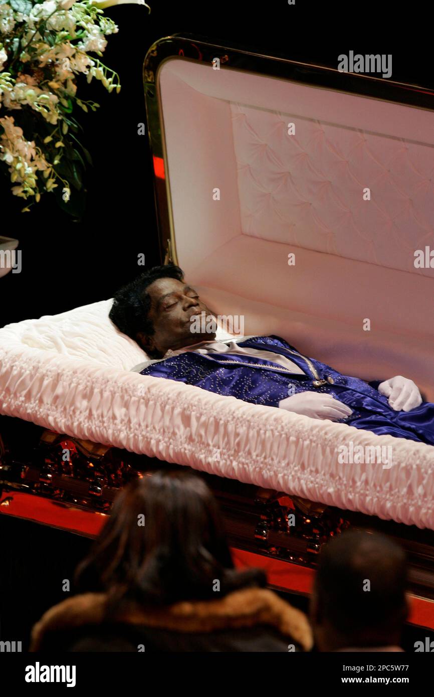 The body of James Brown is on display to the public at the Apollo ...