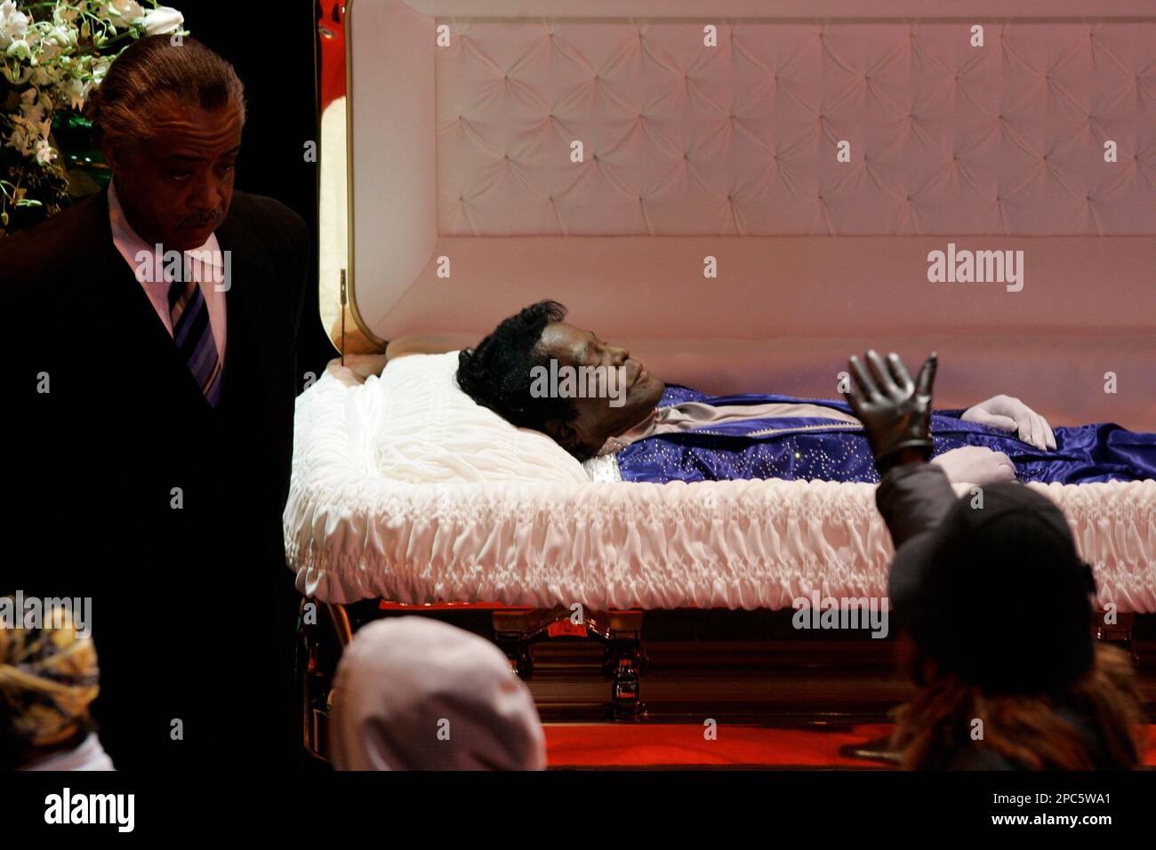 The body of James Brown is on display to the public at the Apollo ...