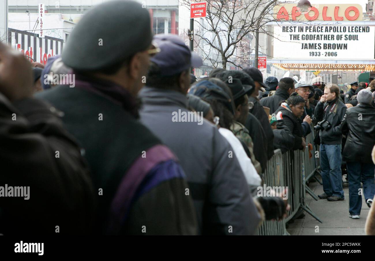 Fans of the late singer James Brown line up at the Apollo theater to ...