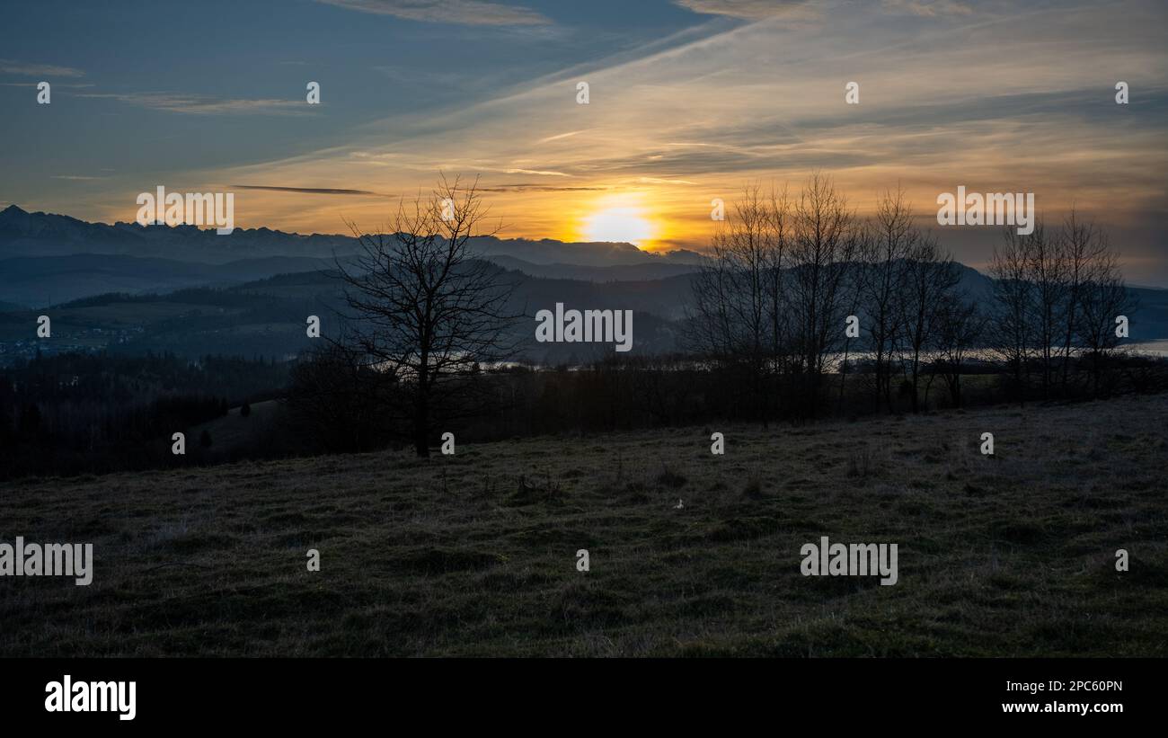 February evening. View from Czorsztyn to the Tatra Mountains against ...