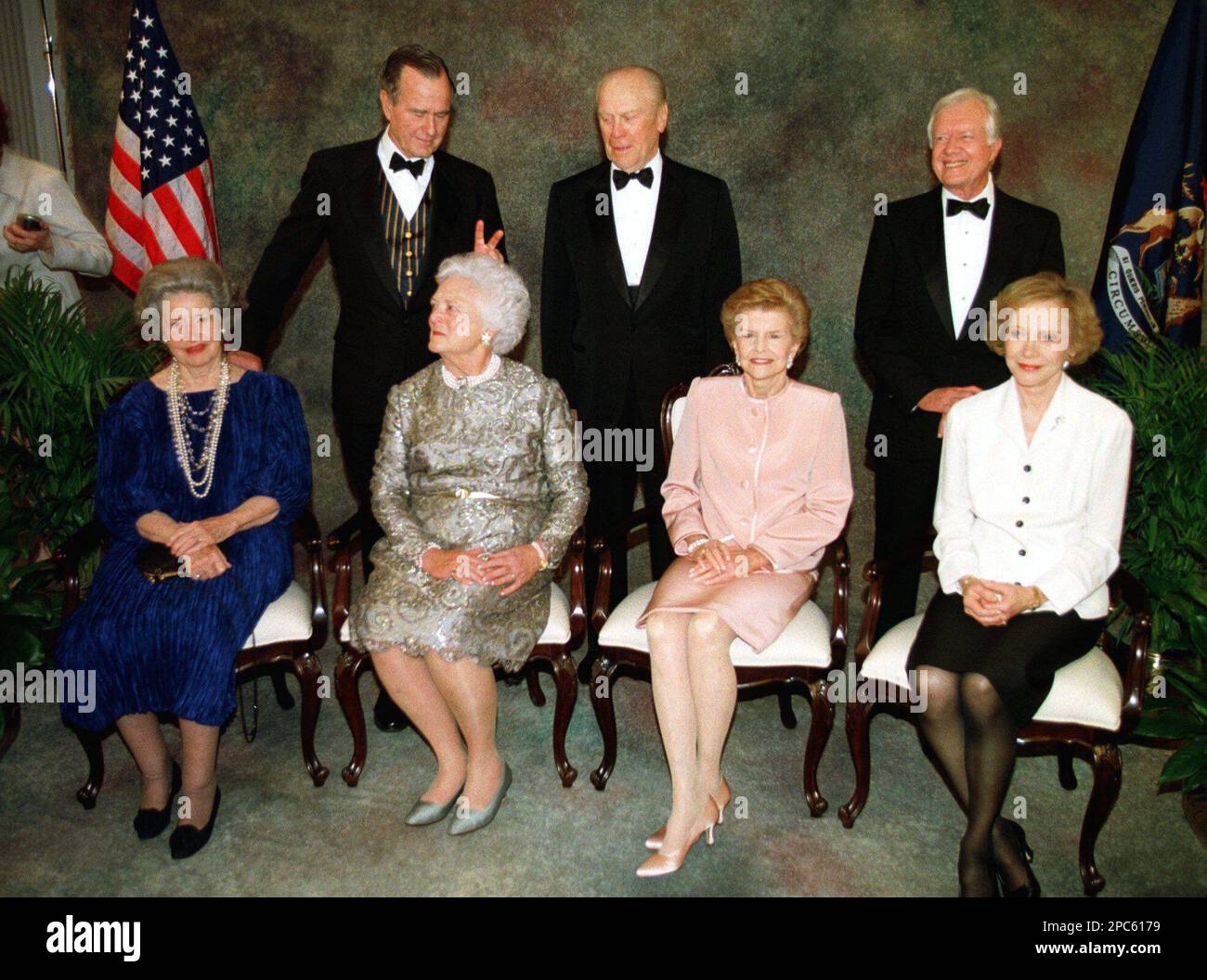 ** FILE ** In a file photo former President George Bush makes rabbit ...