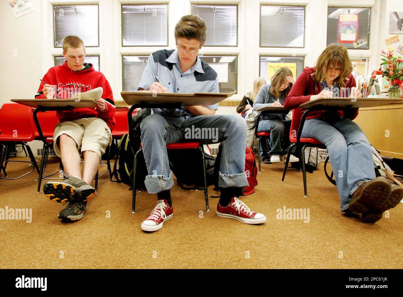 ** FILE ** Dan Green, center, a senior, takes a personality test in ...