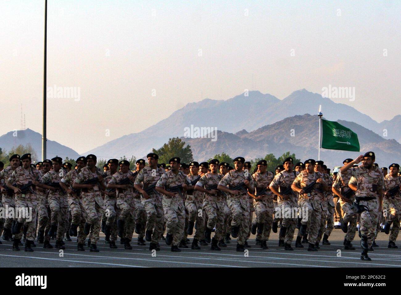 Saudi commandos take part in a parade in Mecca, Saudi Arabia, Tuesday ...