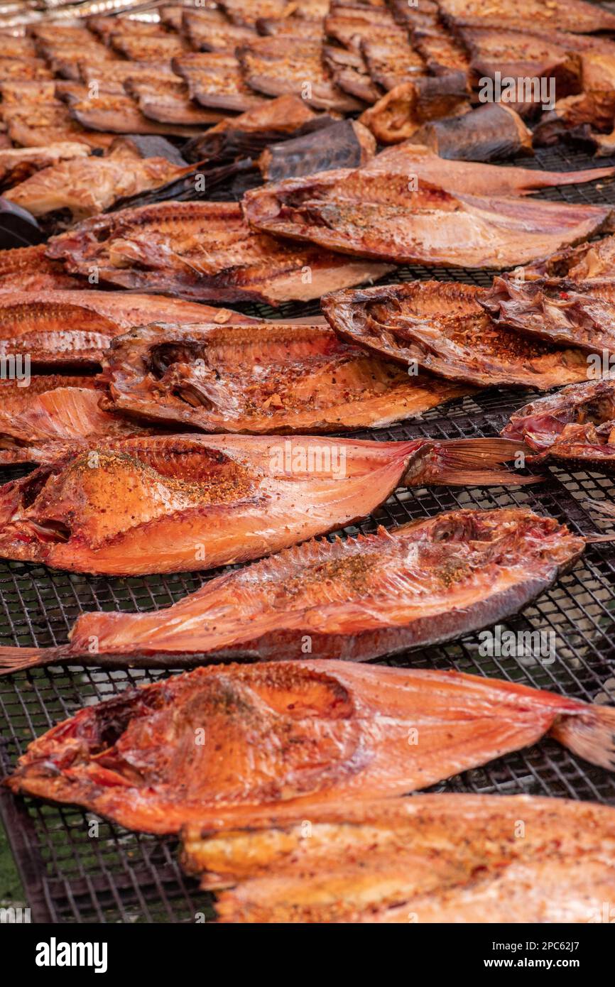 Selling various smoked fish in a street food market in Vilnius ...