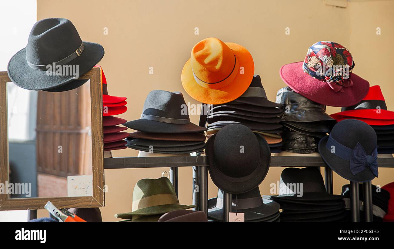 Group of hats in the shop window Stock Photo - Alamy
