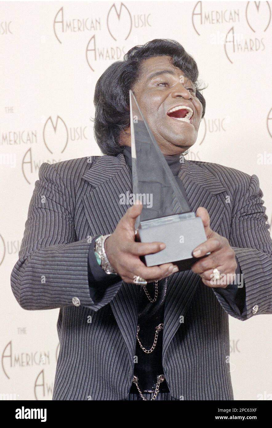 ** FILE ** In a file photo James Brown is shown with his Award of Merit ...