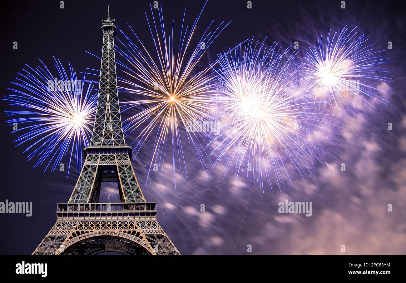 Celebratory colorful fireworks over the Eiffel Tower in Paris, France ...