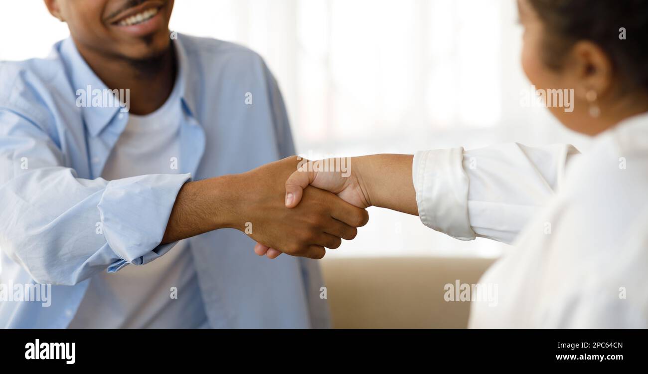 Cropped of psychotherapist and patient shaking hands, successful ...