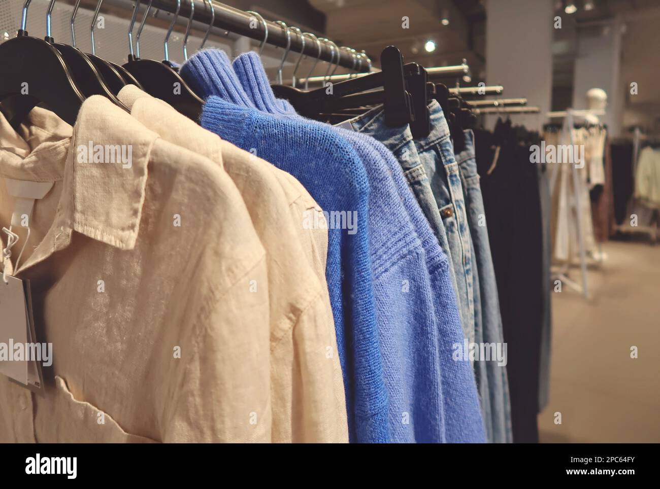 Shirt jeans on clothes hanger hi-res stock photography and images - Alamy
