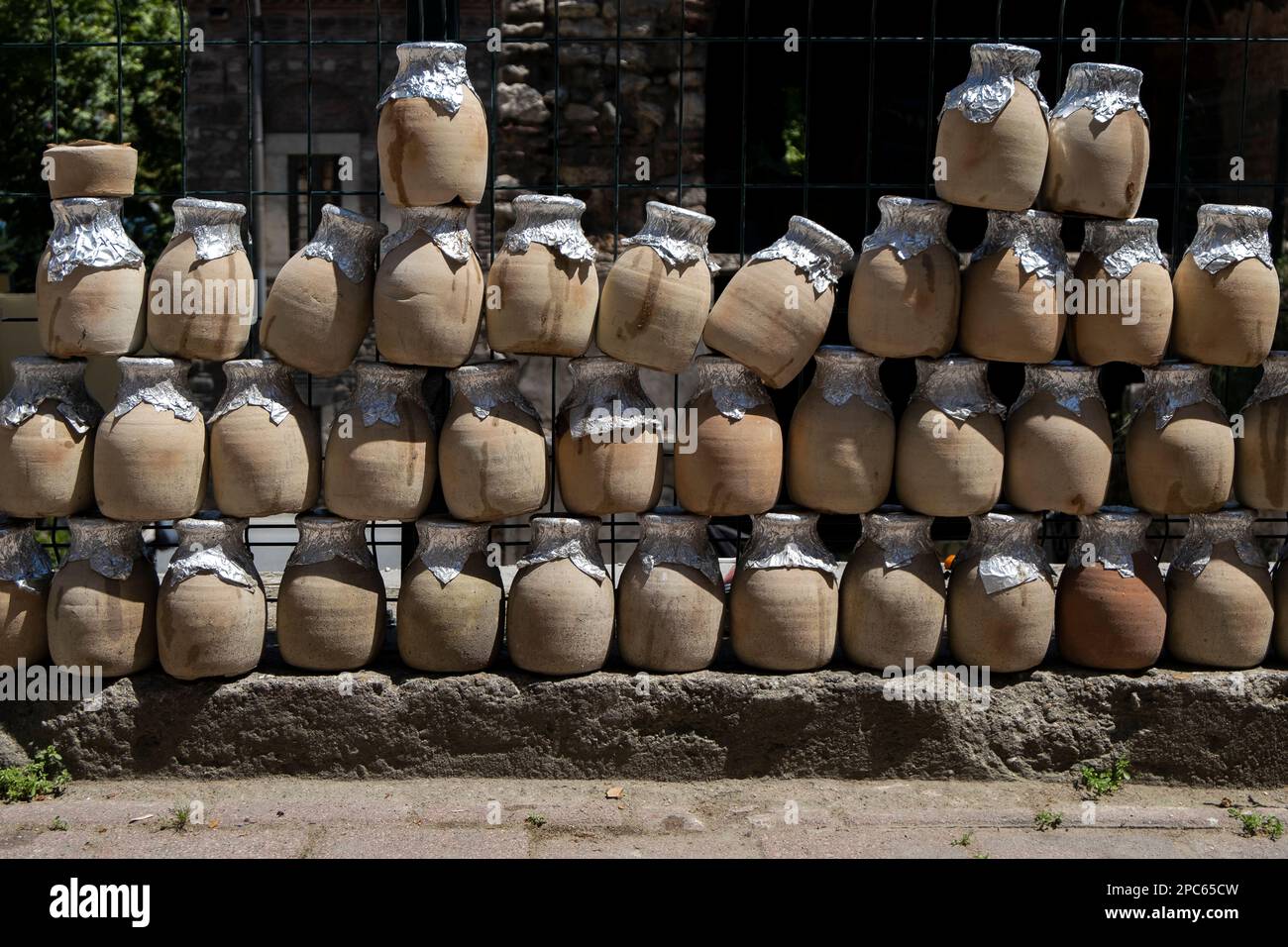 Closeup pattern view of clay pots in Istanbul, Turkey. The jugs using ...