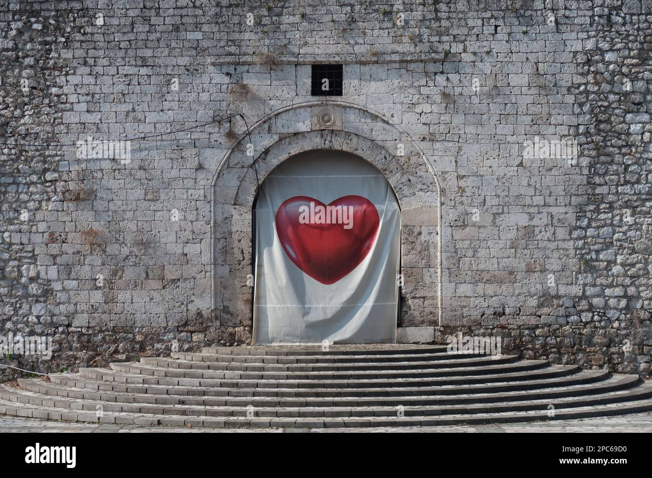 Red heart on the wall Stock Photo - Alamy