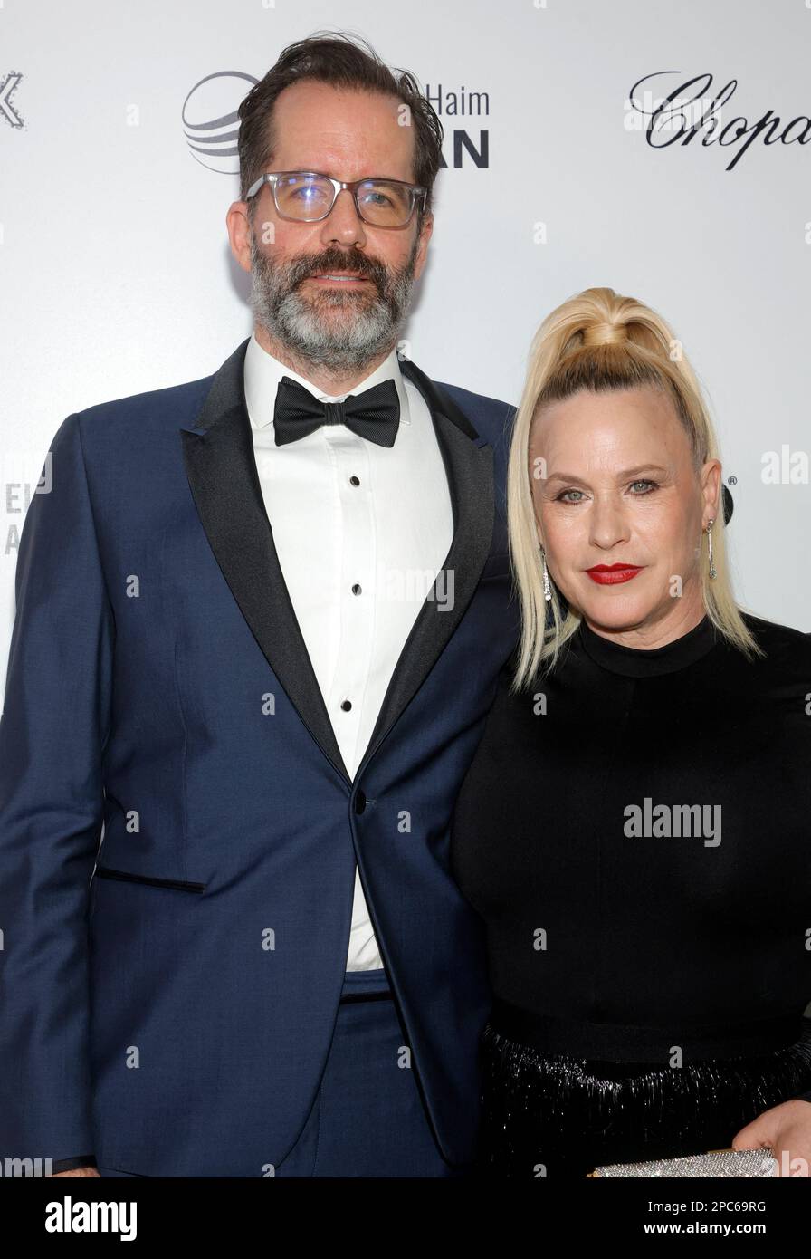 Eric White and Patricia Arquette attend the Elton John AIDS Foundation ...