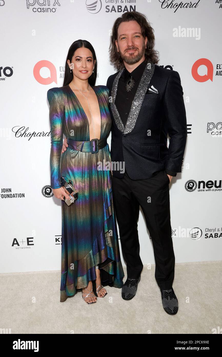 Jennifer HuYoung and JC Chasez attend the Elton John AIDS Foundation's ...