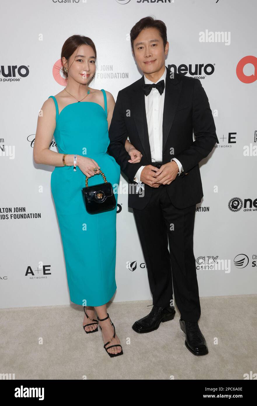 Lee Min-jung and Lee Byung-hun attend the Elton John AIDS Foundation's ...
