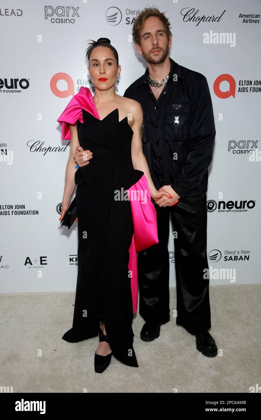 Noomi Rapace and Victor Thell attend the Elton John AIDS Foundation's ...