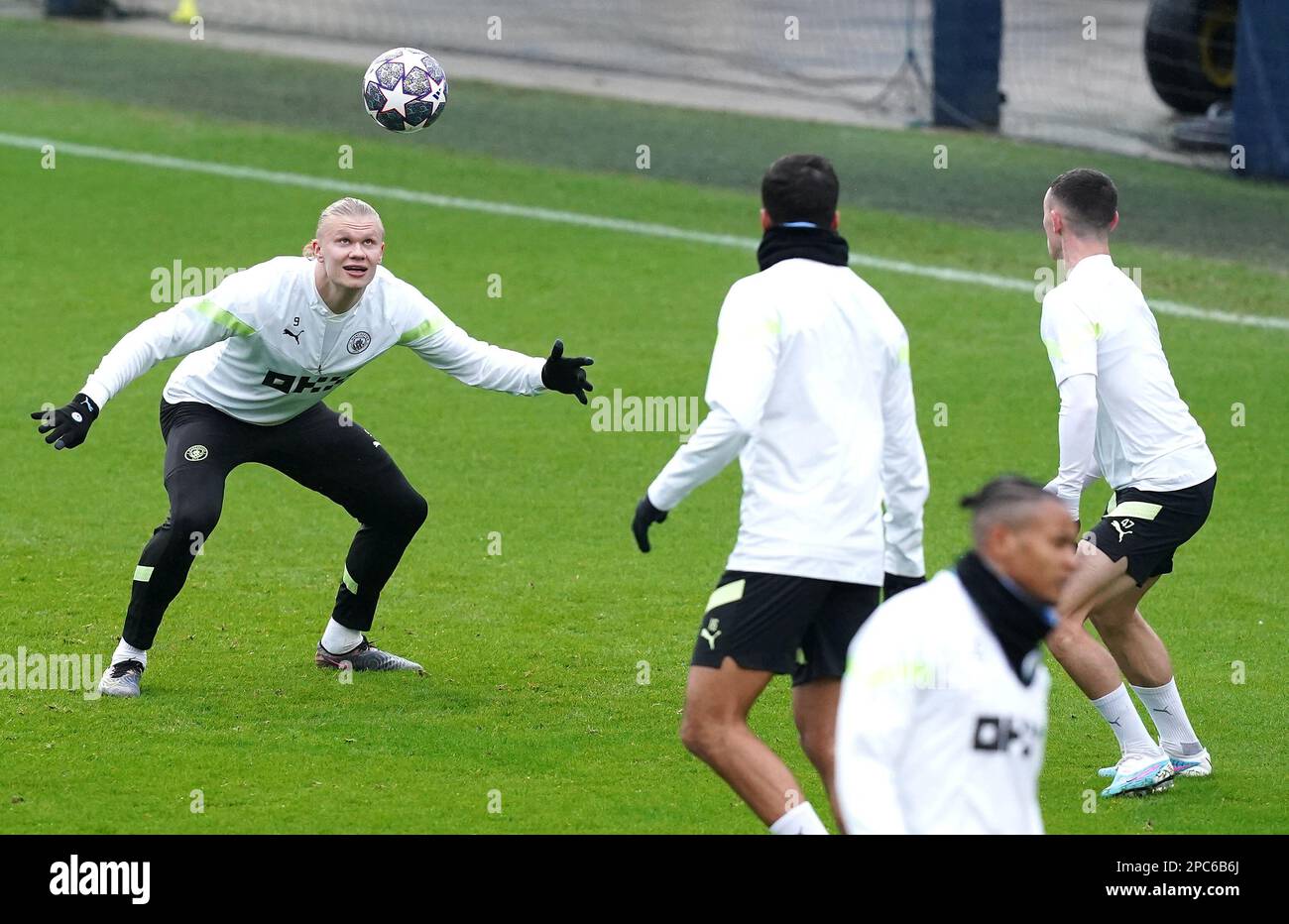 Manchester City's Erling Haaland (left) and team-mates during a ...