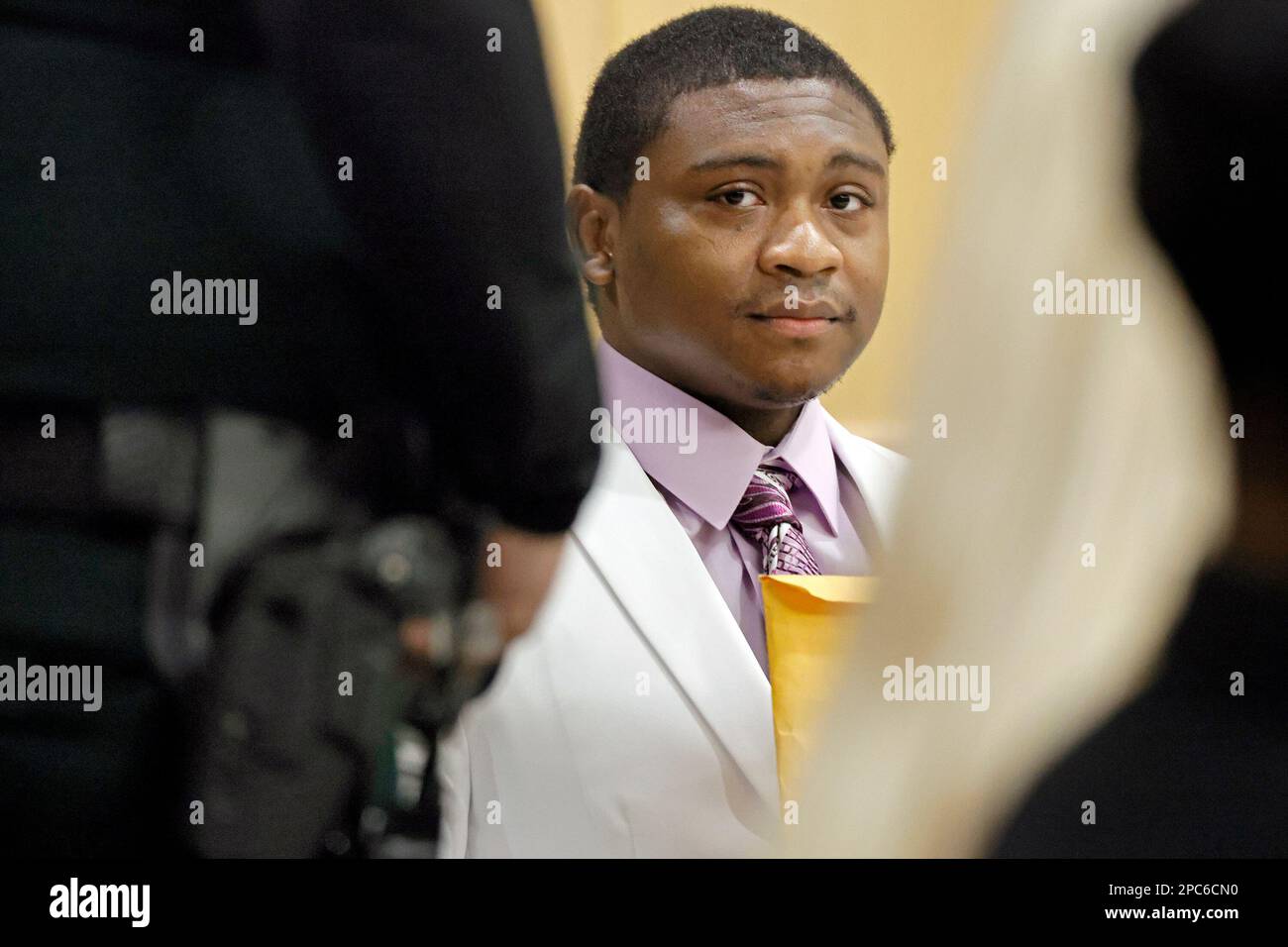 Suspected shooting accomplice Trayvon Newsome is shown at the defense ...