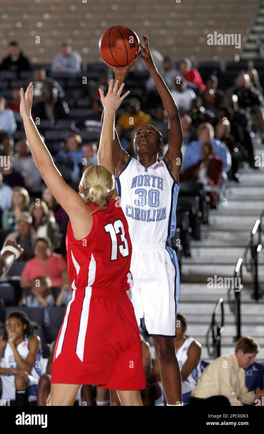 North Carolina's LaToya Pringle (30) shoots over St. John's Tina Sloan ...