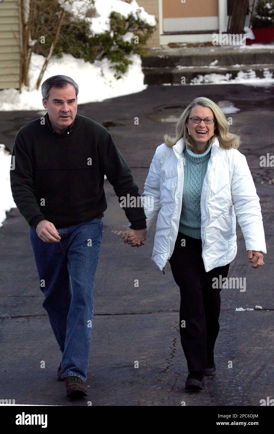 Former Connecticut Gov. John G. Rowland and his wife, Patty, walk up ...
