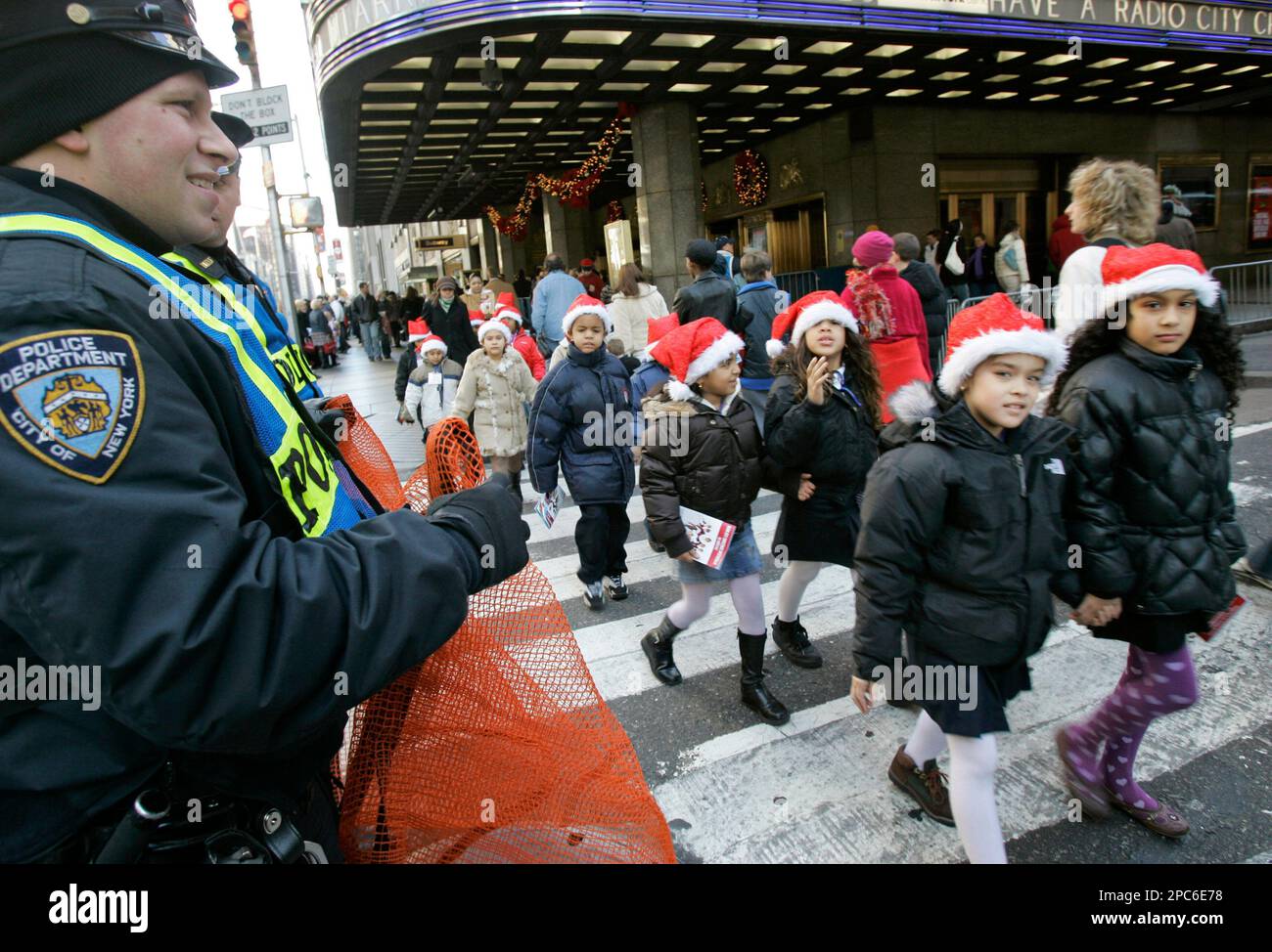 Children from New York City's Public School 161 cross the street in ...