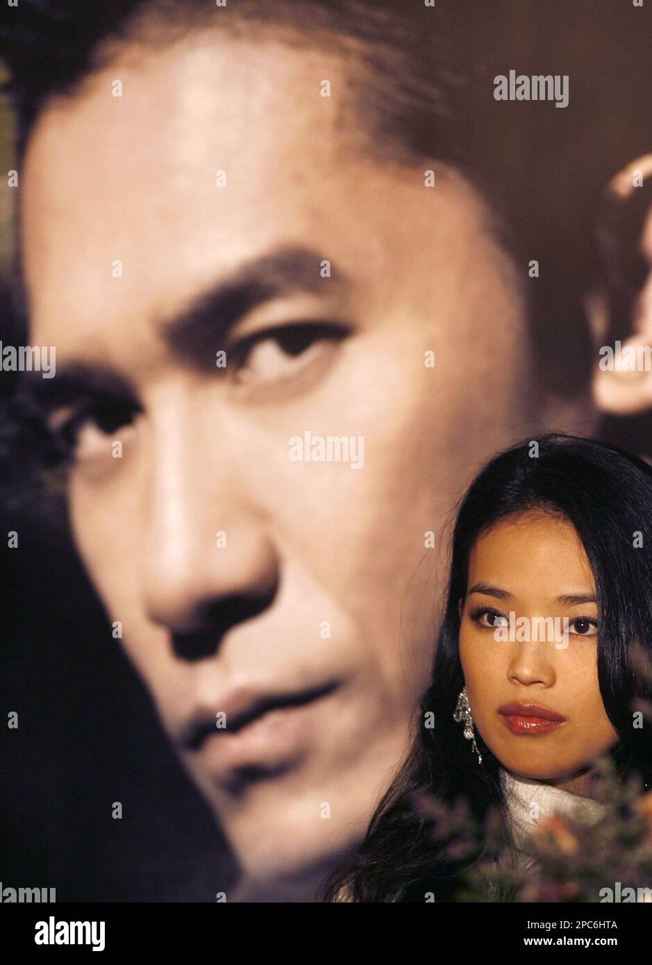 Taiwan actress Shu Qi listens to reporters questions in front of a ...