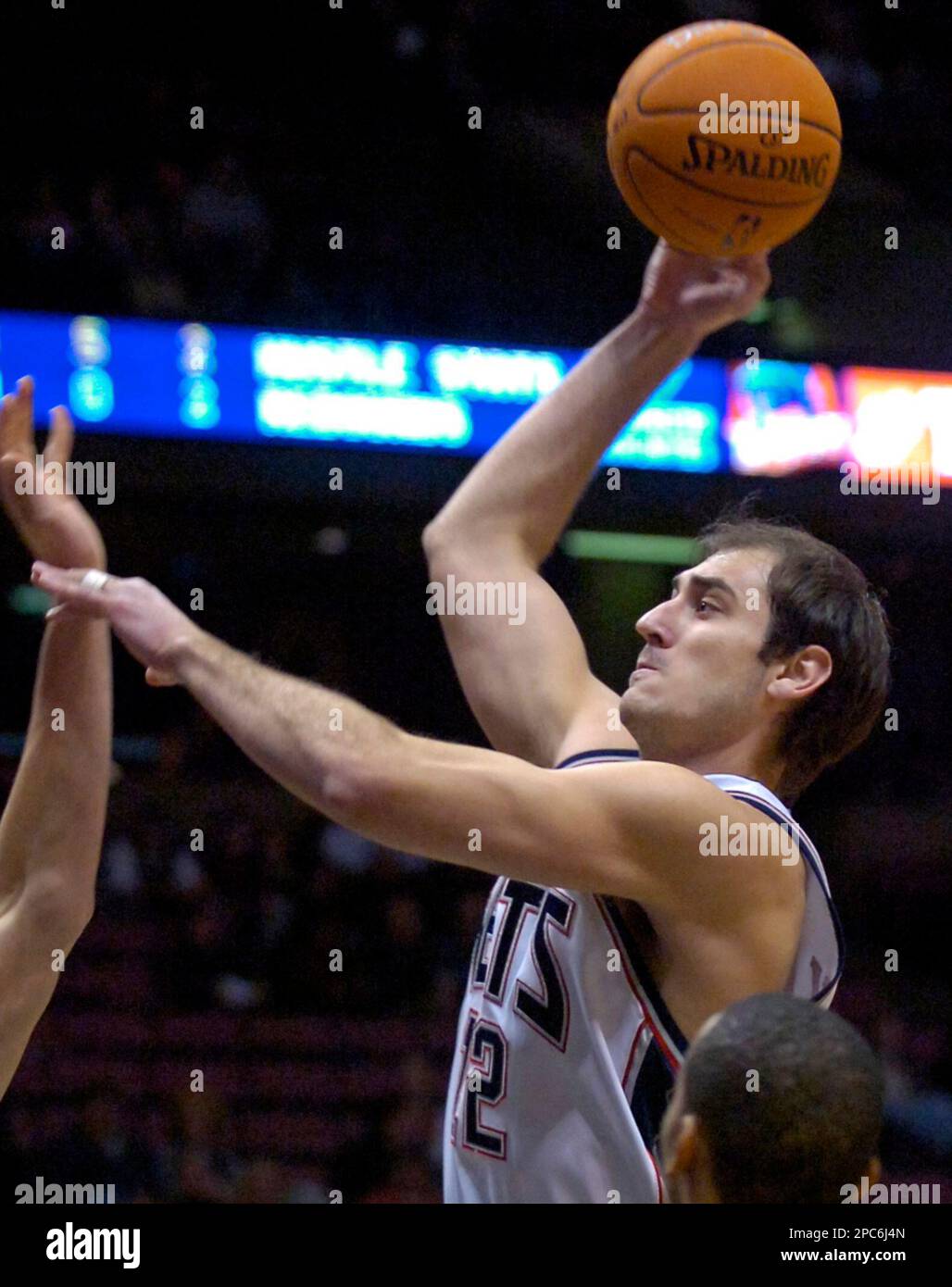 New Jersey Nets' Nenad Krstic, of Serbia, puts up a shot during first ...