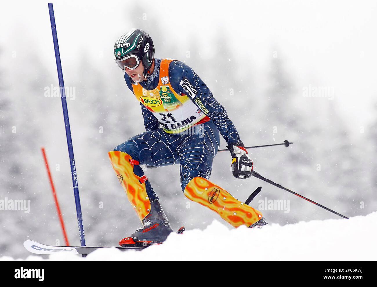 Bode Miller, of the United States, looks on after crashing out during ...