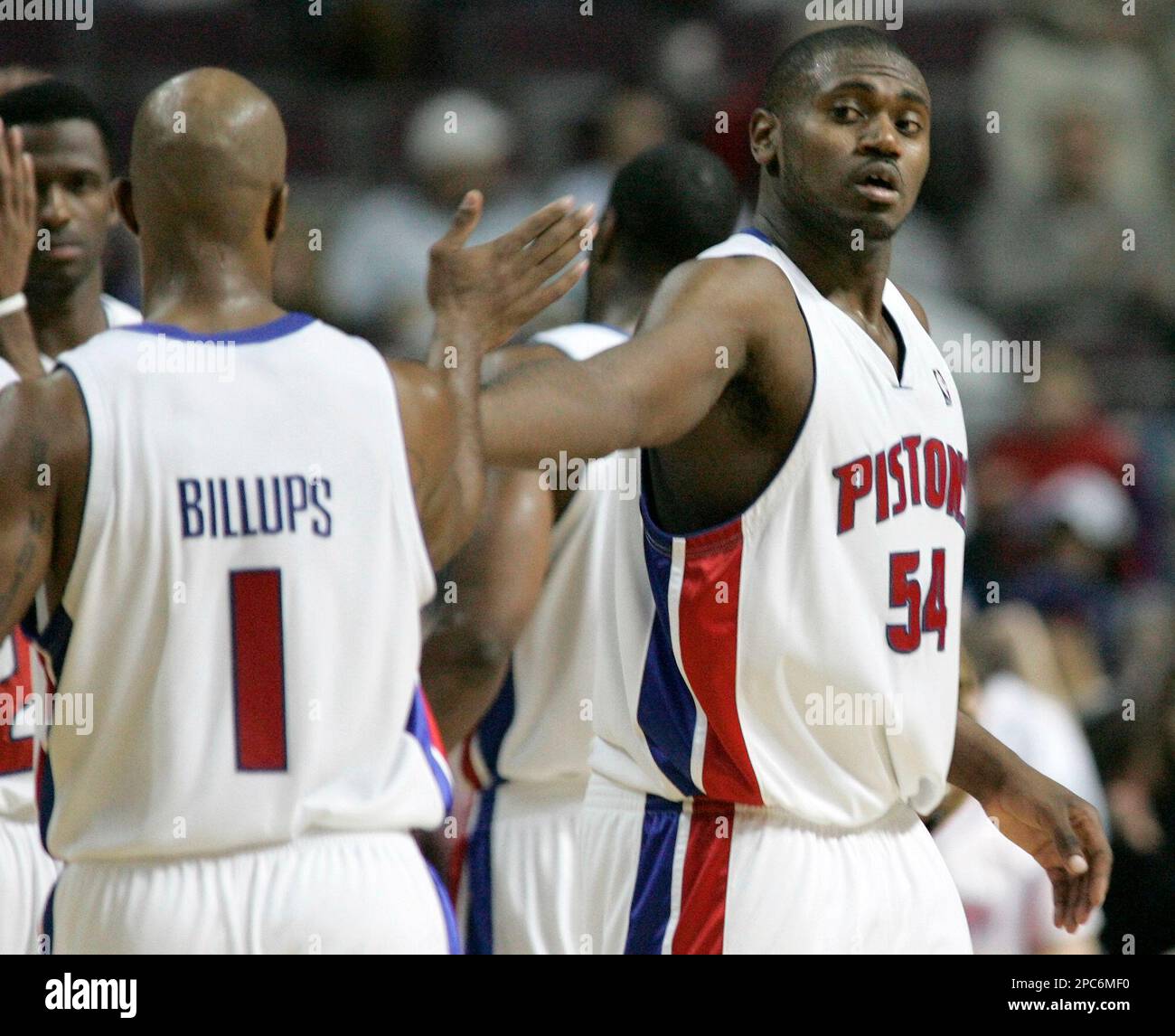 Detroit Pistons forward Jason Maxiell (54) gets a high-five from ...