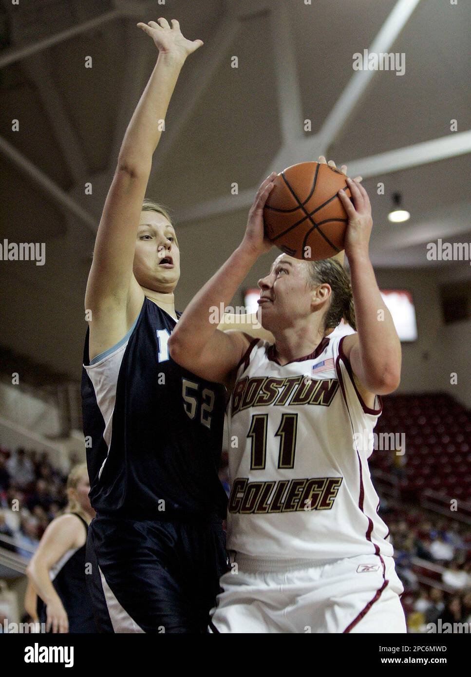 Boston College's Kathrin Ress (11) shoots over Maine's Sandra Vaitkute ...
