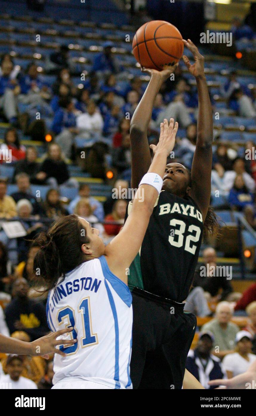Baylor's Bernice Mosby (32) shoots over UCLA's Amanda Livingston (31) in the first half of their ...