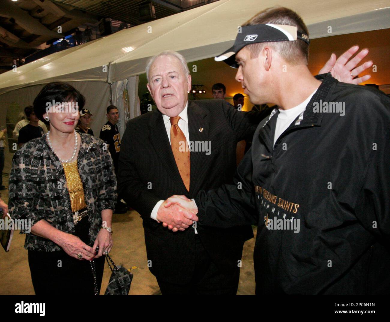 New Orleans Saints owner Tom Benson, center, and his wife Gayle, left ...