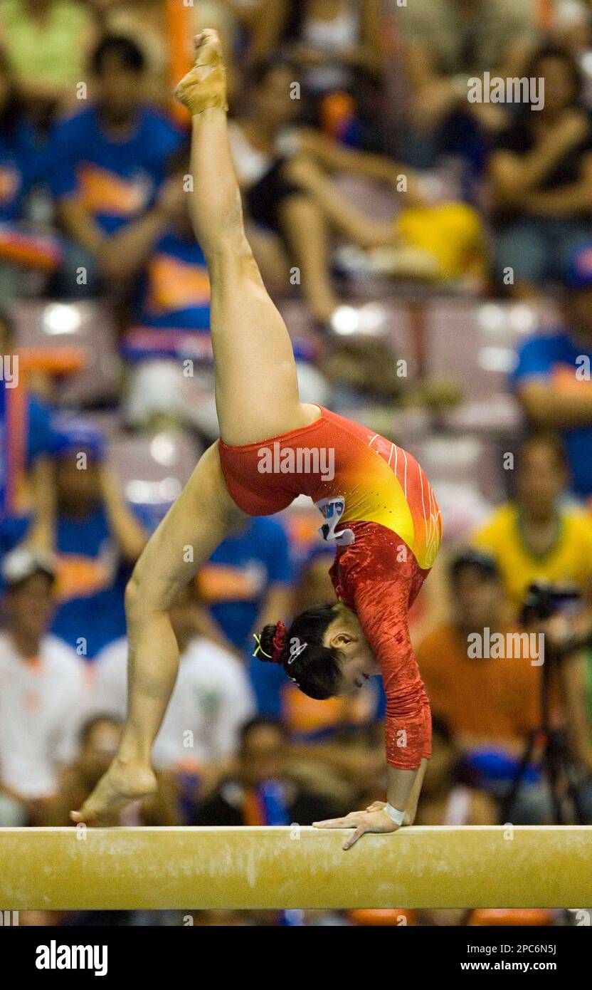 China's Li Ya performs to win the balance beam event during the ...