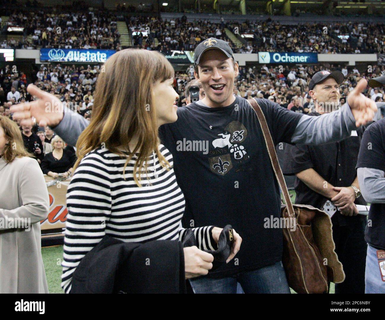 Entertainers Hilary Swank, foreground, and Harry Connick, Jr. enjoy a ...