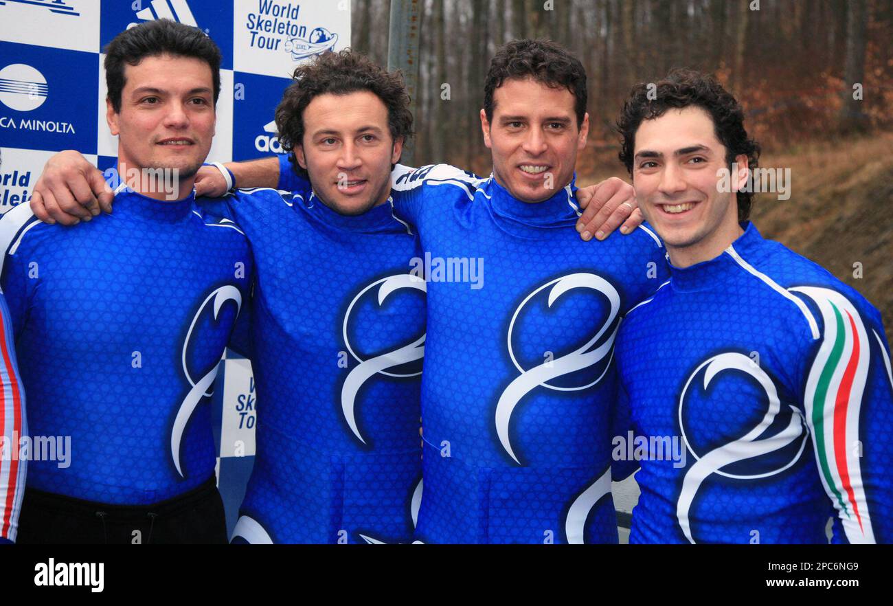 Italy's bobsled team, from left to right, Fabrizio Tosini, side-pushers ...