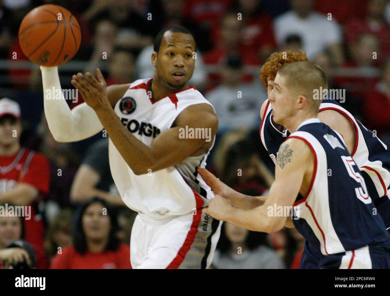 Georgia guard Sundiata Gaines, left, is double-teamed by Gonzaga guard ...