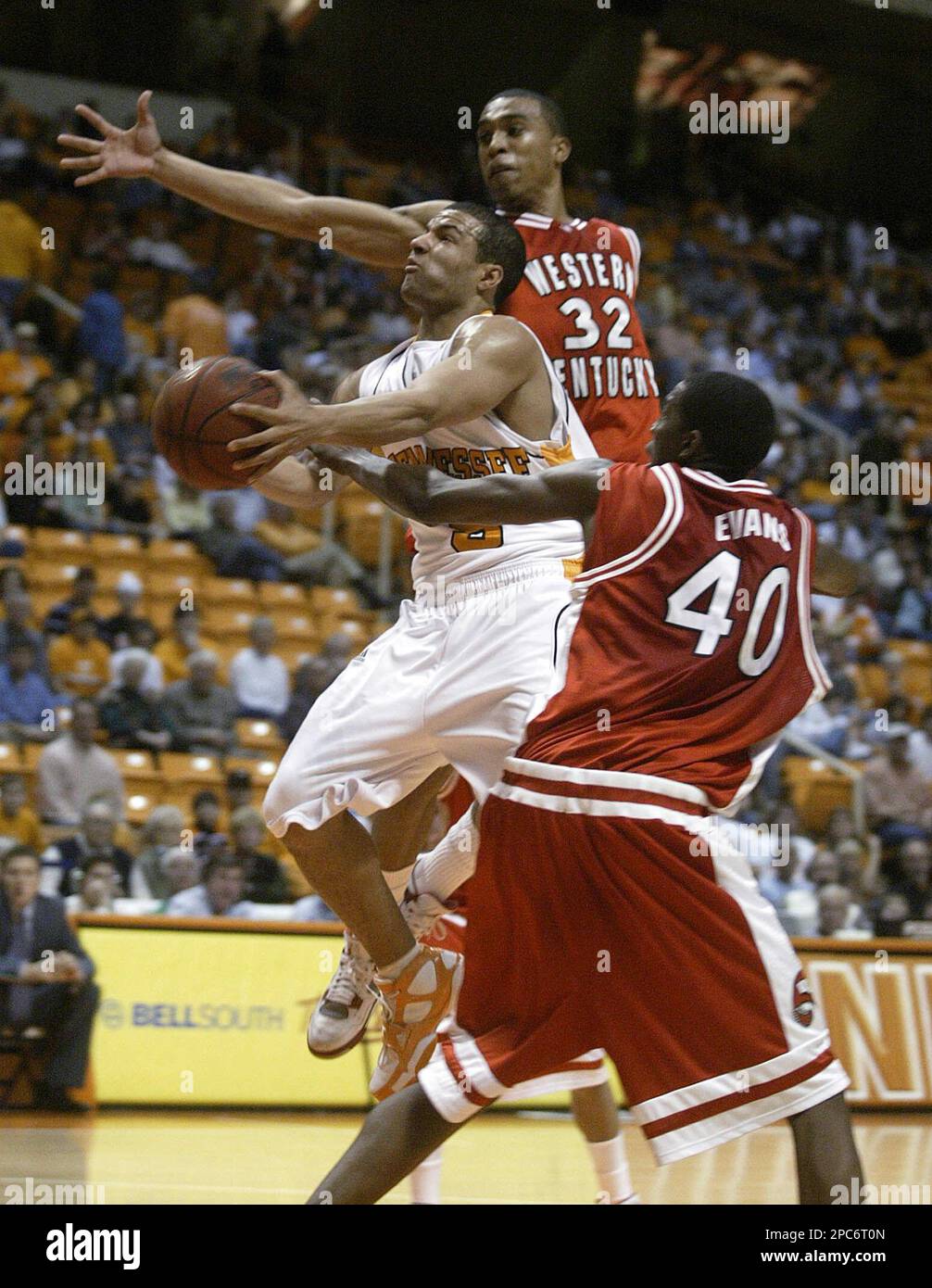 Tennessee's Chris Lofton, center, puts up a shot between Western ...