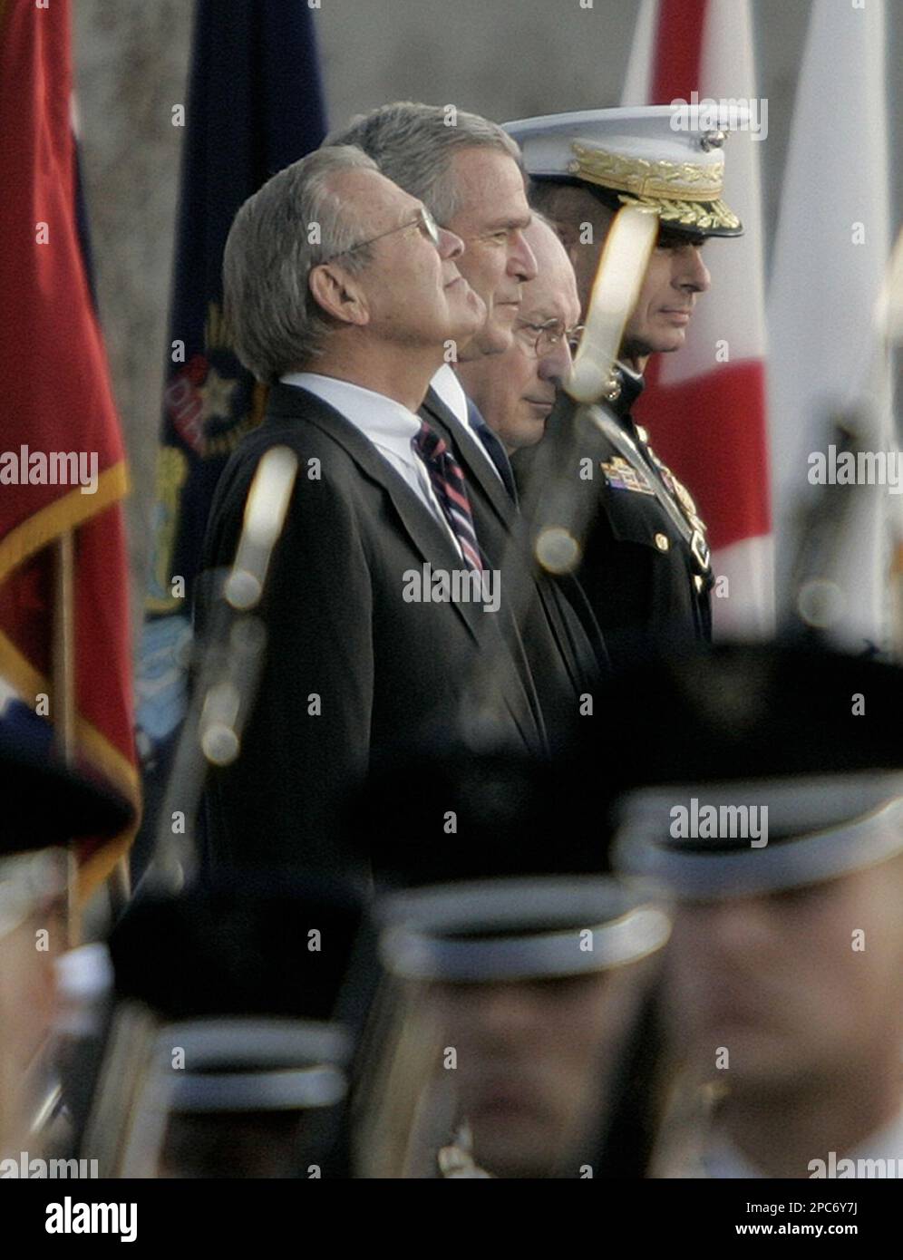 Outgoing Defense Secretary Donald H. Rumsfeld, and, from second from ...