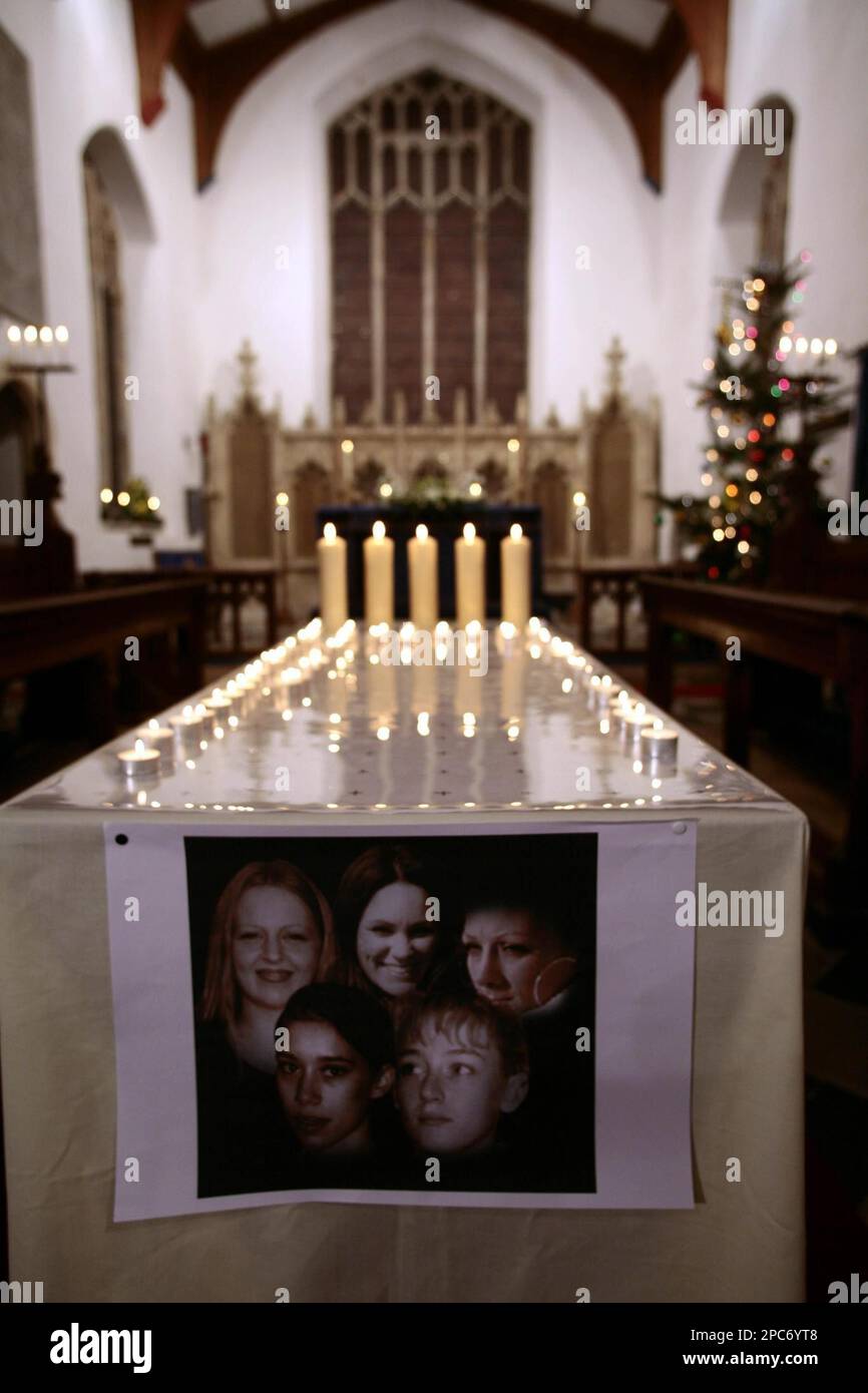 Lit candles and a montage picture of the five young prostitutes, from ...