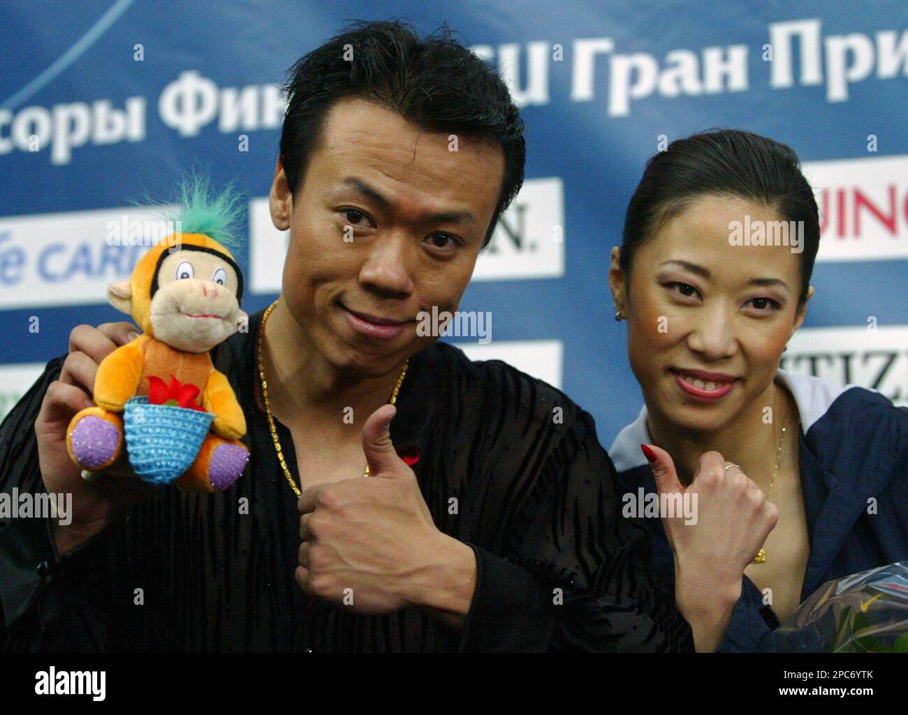 China's Xue Shen and Hongbo Zhao are seen after performing their short program during the ISU ...