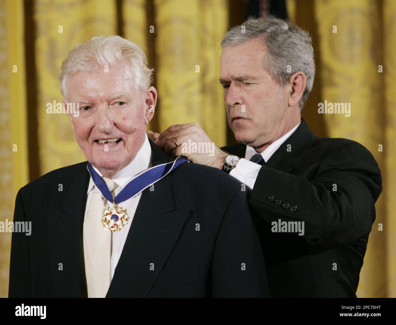President Bush, right, bestows the Presidential Medal of Freedom to ...