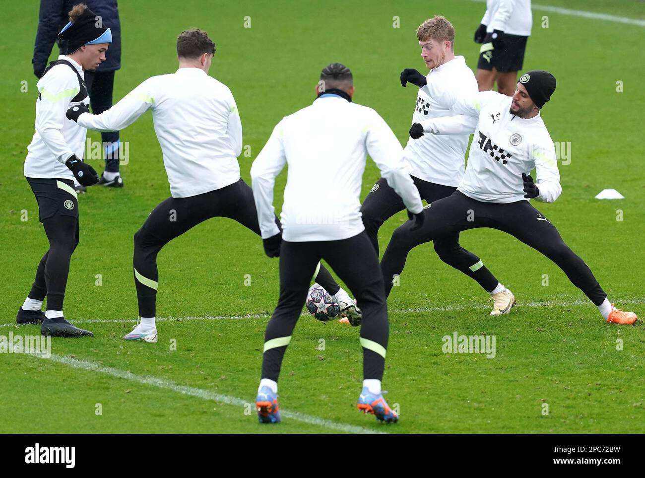 Manchester City's Kalvin Phillips (left), John Stones, Manuel Akanji ...