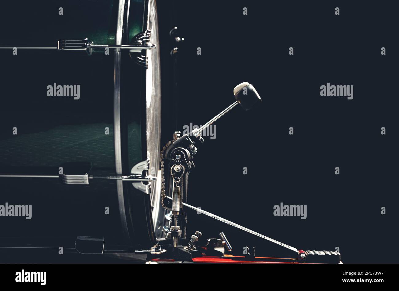 Bass drum with pedal, musical instrument on black background Stock ...