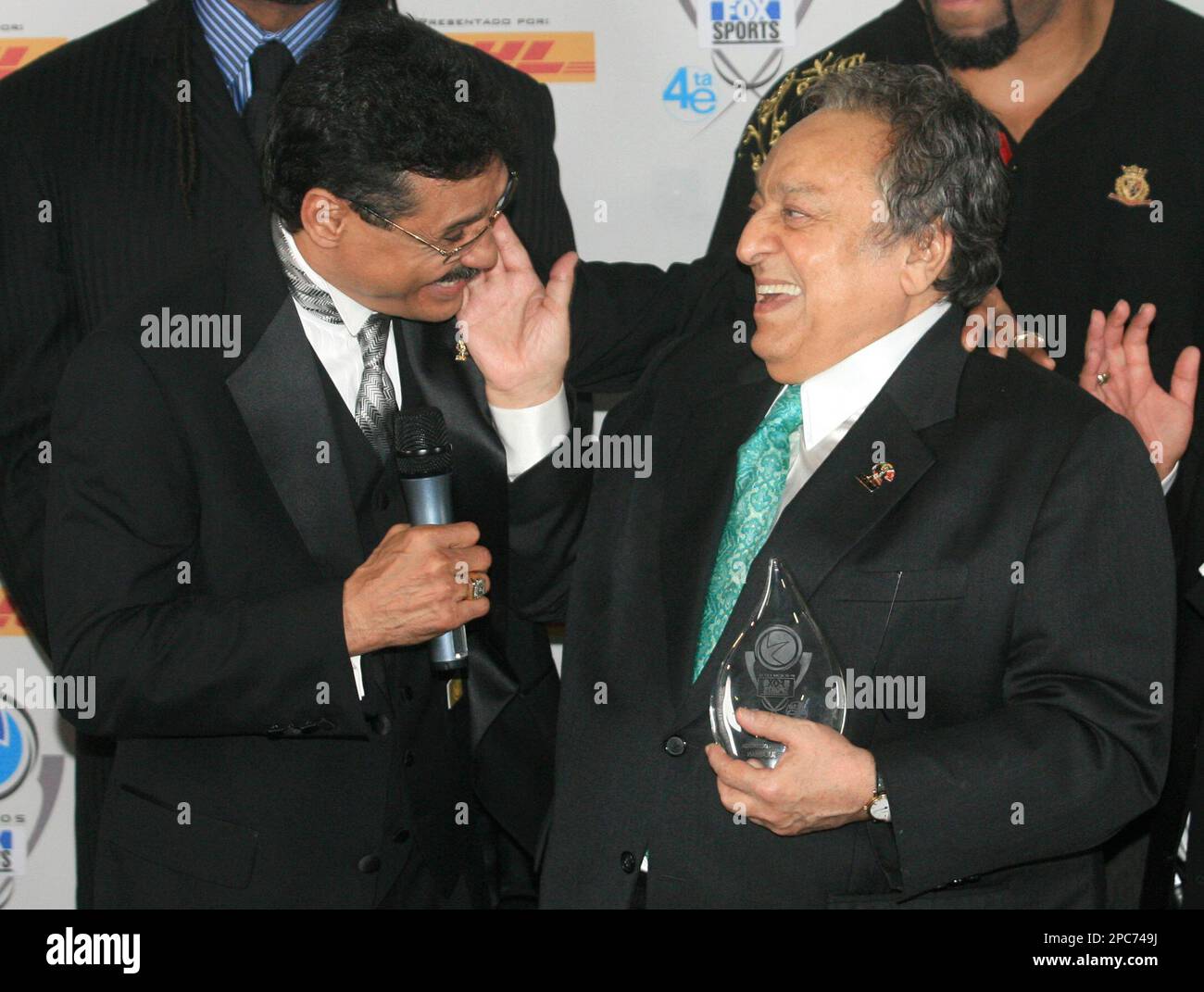 International Boxing Hall-of-Famer Jose Sulaiman, right, of Mexico ...