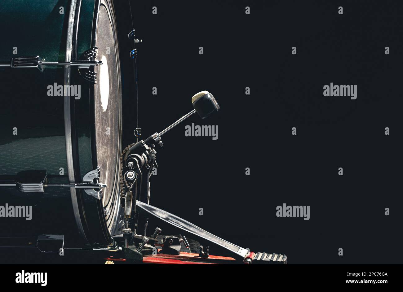 Bass drum with pedal, musical instrument on black background Stock ...