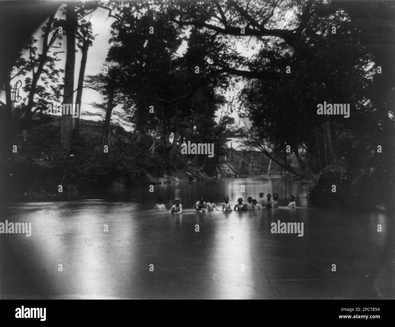Soldiers bathing, North Anna River, Virginia--ruins of railroad bridge ...